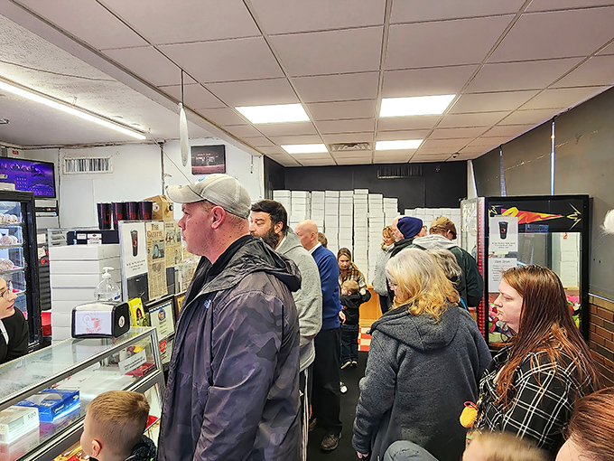 The morning rush brings together construction workers and retirees in perfect donut shop harmony.