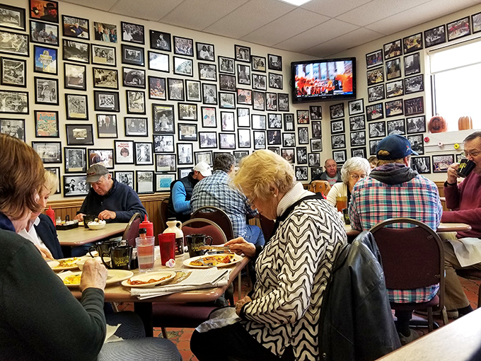 The breakfast club in session. These patrons aren't just eating—they're participating in a time-honored ritual of community and comfort food.
