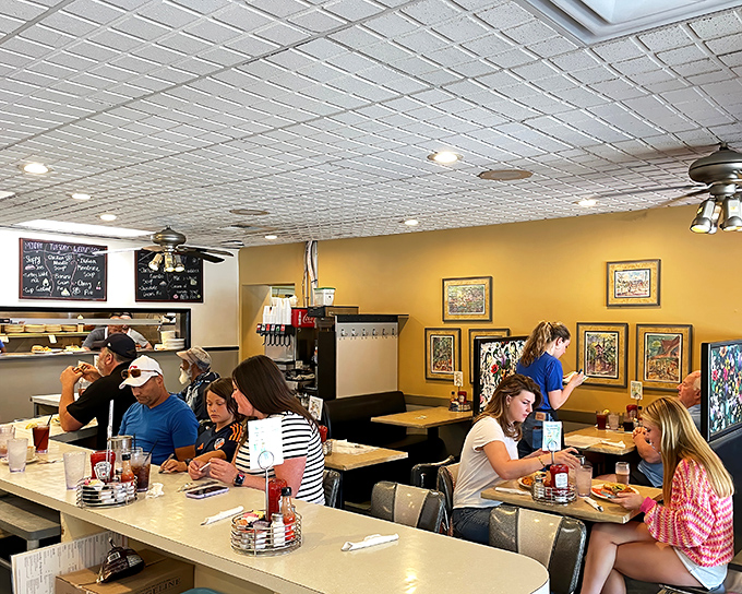 Where strangers become neighbors and neighbors become friends – The Echo's dining room hums with the symphony of clinking forks and genuine conversation.