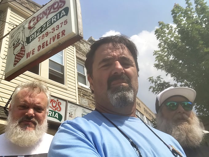 Pizza pilgrims at their destination. When the food is this good, you take photographic evidence.