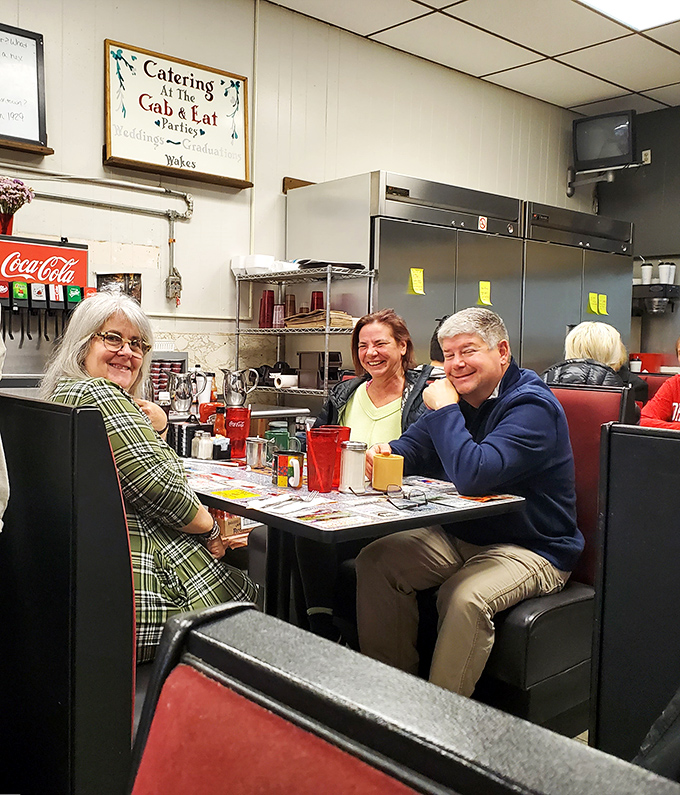The true measure of a great diner isn't just the food – it's the community that gathers around these tables, sharing stories between sips of coffee.