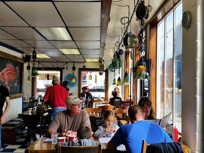 Where locals and visitors unite under the universal religion of good seafood. Notice how nobody's looking at their phones—the food commands full attention.