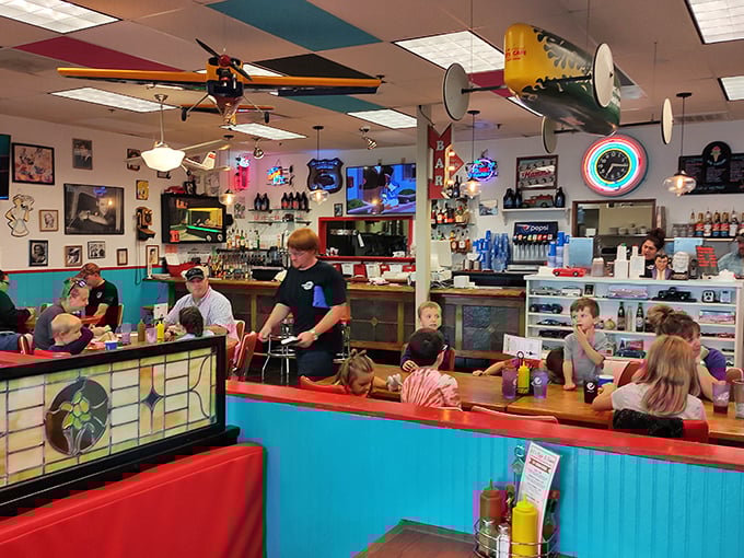 Where families gather around condiment caddies and the buzz of conversation competes with the sizzle from the grill.