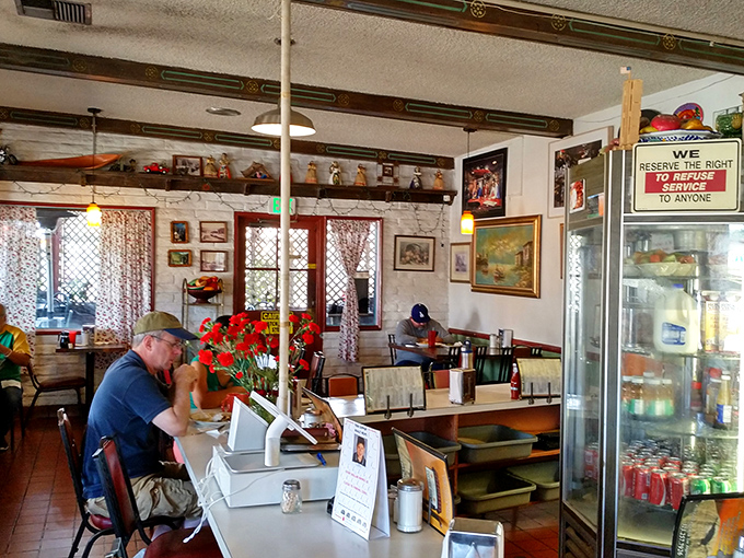 Where breakfast conversations flow as freely as the coffee—a snapshot of community happening between bites of perfect morning fare.