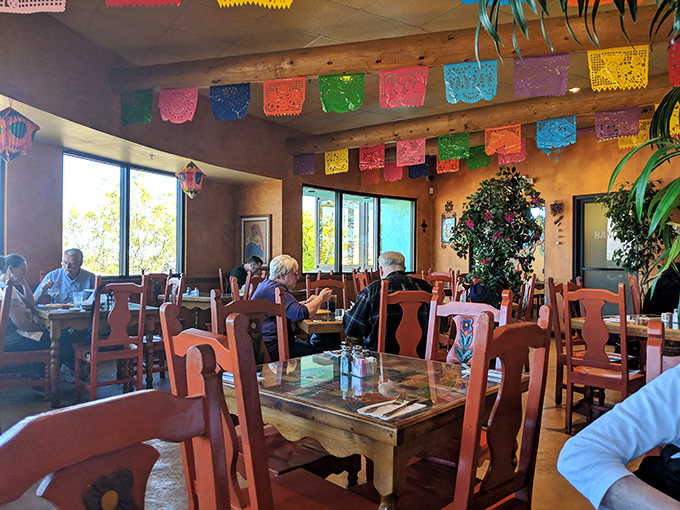 The papel picado banners aren't just decorative—they're celebrating your excellent decision to eat here today.