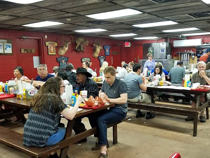 The diverse crowd at Cooper's proves great barbecue transcends all demographics—cowboys, tourists, and locals all bow to the power of perfect brisket.