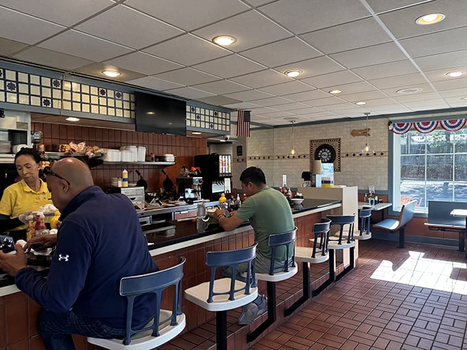 The counter crew—where regulars become family and newcomers quickly learn why this place has such a devoted following. 