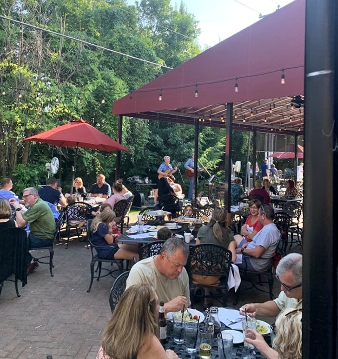 The outdoor patio comes alive with music and laughter—proof that al fresco dining in Ohio can rival anything you'd find along the Mediterranean coast.