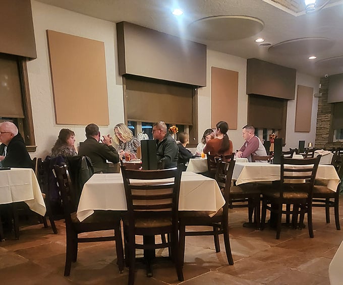 Where memories are made between bites. Notice how nobody's looking at their phones—the food commands complete attention.