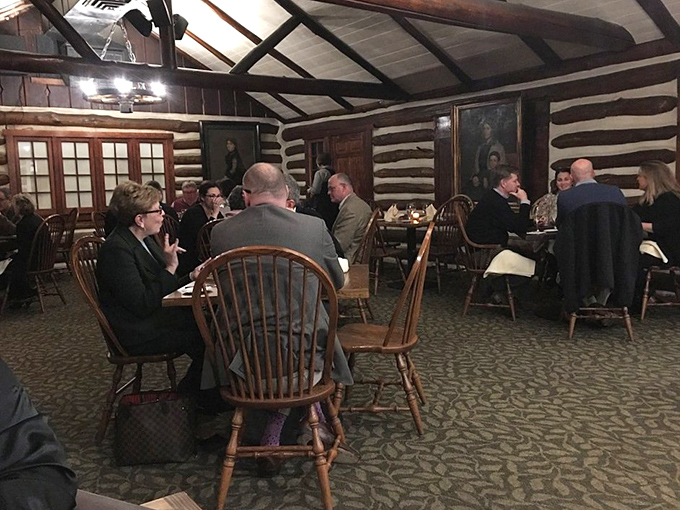 Happy diners sharing stories and laughter - the true measure of any restaurant's genuine success story.