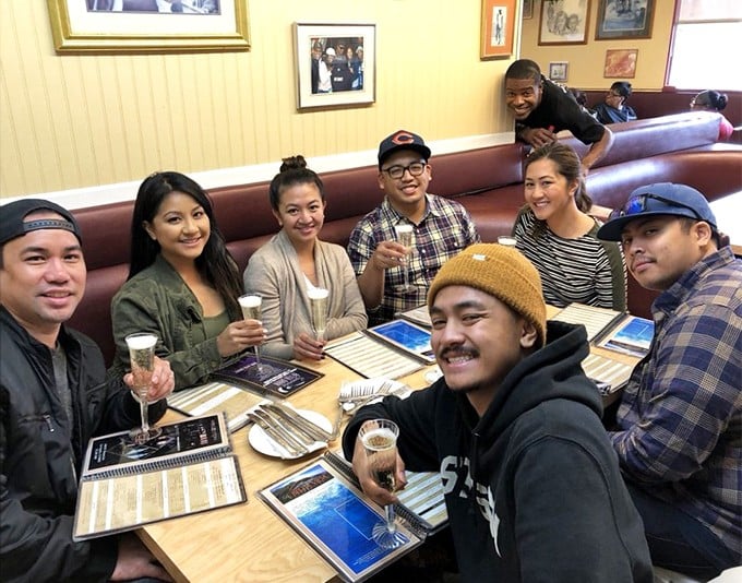 Good food brings good people together. These diners aren't just eating breakfast – they're creating memories that will outlast the meal itself.