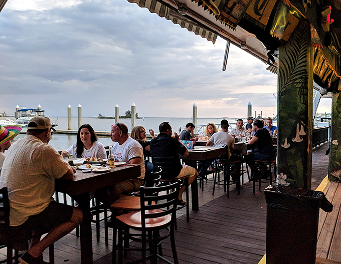The outdoor deck at sunset is where memories are made—and where locals bring out-of-town guests to inspire serious Florida envy.