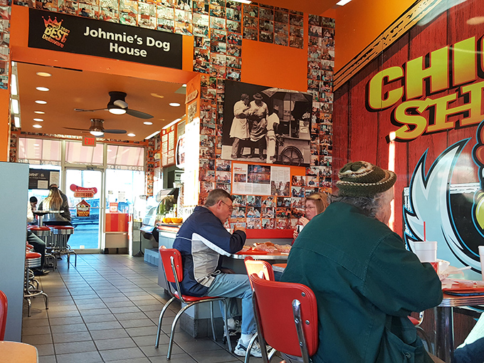 Where strangers become friends over shared appreciation of perfectly fried chicken. Notice nobody's checking their phones—food this good demands attention.