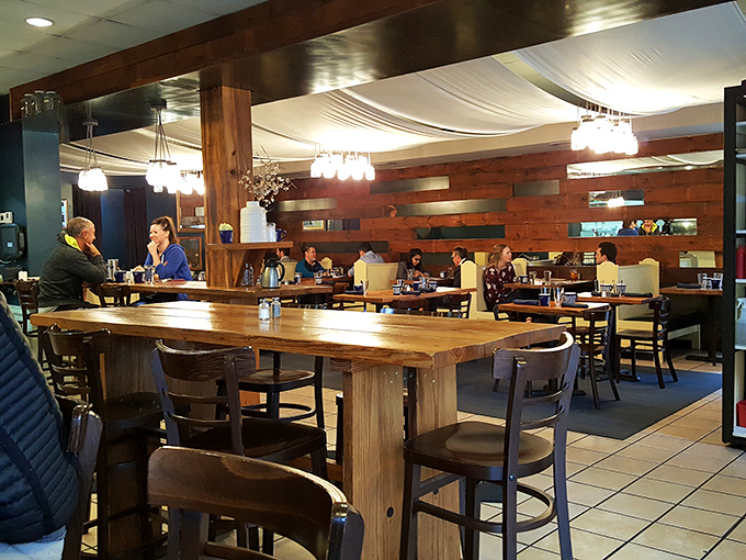 Where strangers become friends over shared breakfast enthusiasm – the dining room hums with the satisfaction of good decisions made.
