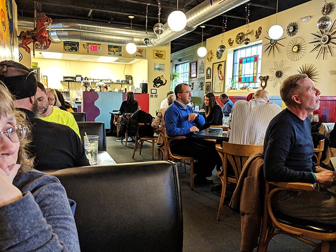 Weekend brunch in full swing – where strangers become temporary neighbors united by the universal language of "pass the hot sauce, please."