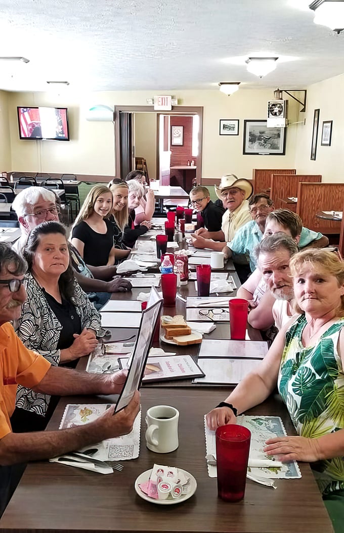 Multi-generational gatherings around these tables aren't just meals—they're memory-making sessions with fried chicken as the guest of honor.