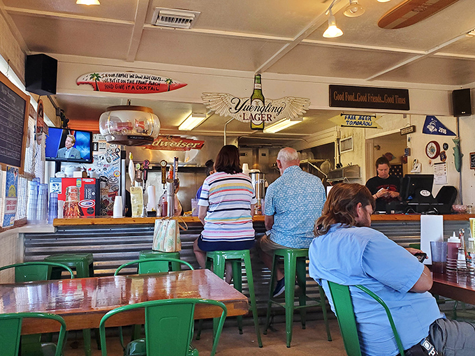 The chalkboard menus and beer signs create that authentic "locals know best" atmosphere. No interior designer needed when the food speaks this loudly.