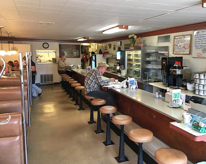 The counter crew—Defiance's morning parliament where coffee flows freely and world problems are solved before noon.