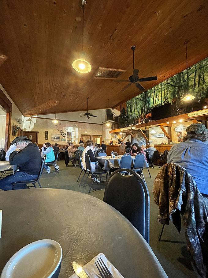 The dining room hums with the universal language of satisfaction—forks pausing mid-air as stories and laughter flow freely.
