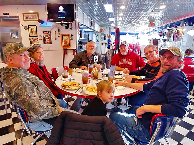 The true heart of any great diner—multi-generational gatherings where stories flow as freely as the coffee, creating memories between bites.