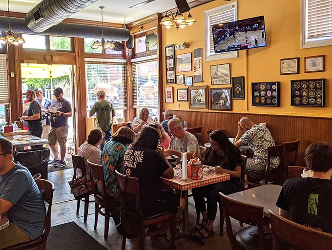 A full house of happy diners, each experiencing their own personal moment of barbecue bliss—this is what contentment looks like in its natural habitat.