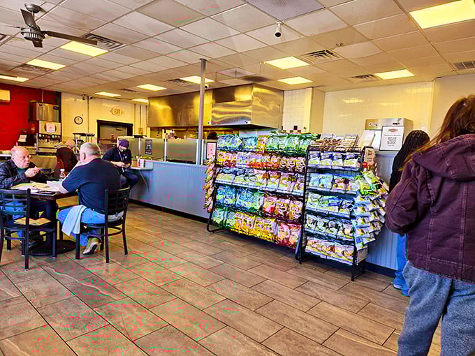 Where strangers become friends united by the universal language of "that looks amazing." Chip rack selection: serious business.