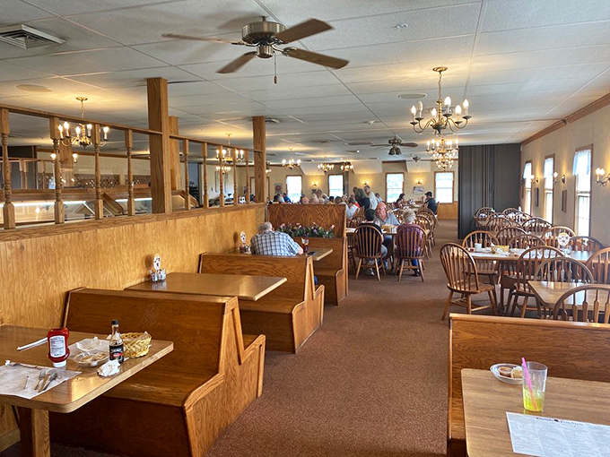 The wooden booths have witnessed countless family gatherings, first dates, and the silent nods of appreciation that follow that first bite.