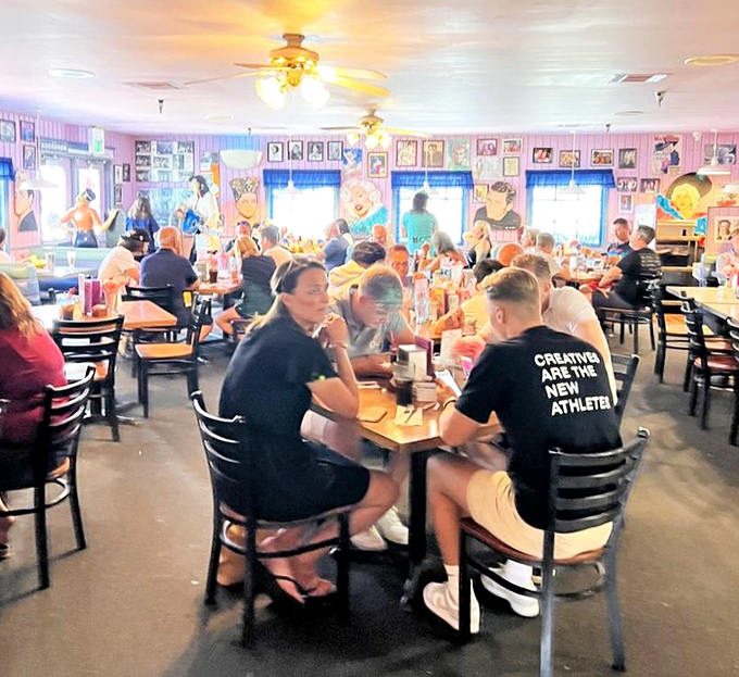 A full house is the best review—locals and travelers alike gathering under pink walls and ceiling fans to share in this desert oasis of comfort food.
