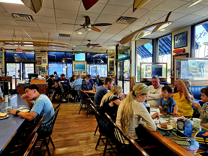 Morning conversations and coffee refills—the true soundtrack of a great breakfast joint where strangers become friends over shared maple syrup.