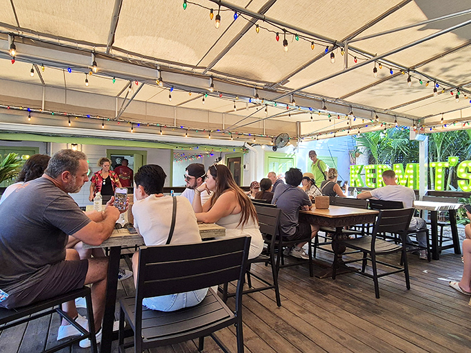 Pilgrims of the pie gather under the canopy, united in their quest for the holy grail of Florida desserts—no passport required, just an appetite.