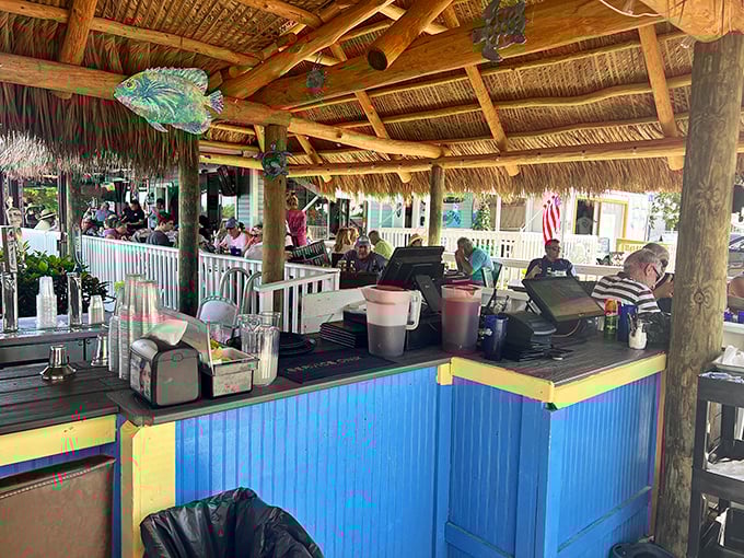 The tiki bar's rustic wooden beams have witnessed countless toasts, first dates, and "I caught a fish THIS big" stories—some of which might even be true.