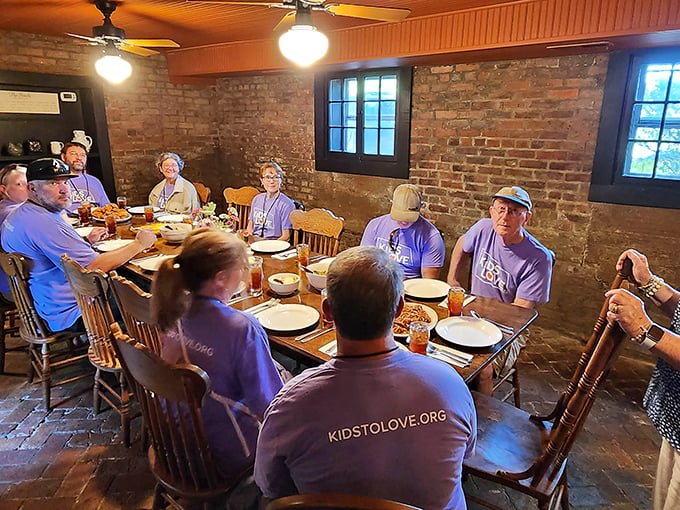 The true magic of communal dining: strangers sharing stories and sides, creating memories around a table that's seen generations do the same.