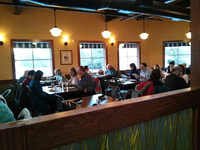 Diners lean in over their tables, engaged in that universal body language that says, "I'm too busy enjoying this food to finish my sentence."