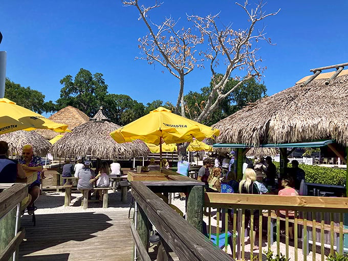 Yellow umbrellas dot the outdoor deck like tropical flowers, shading happy diners from the Florida sun while they soak up those million-dollar river views.