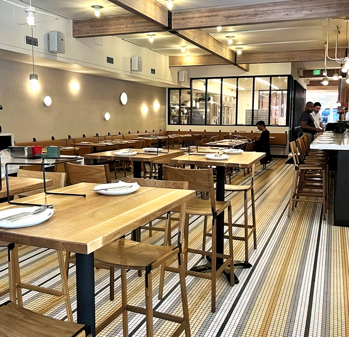 Clean lines, natural wood, and thoughtful design that lets the food be the real star. Minimalism that doesn't feel cold – just right.