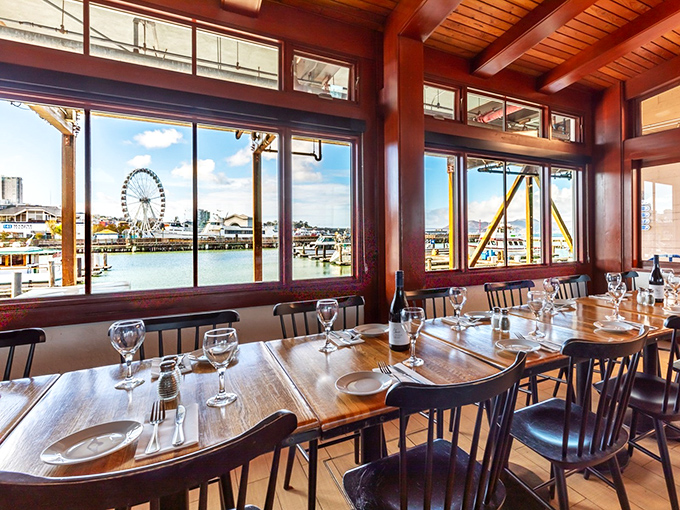 Window seats offer dinner and a show—featuring the bay, boats, and occasionally, the perfect sunset cameo appearance.