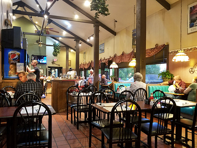Exposed beams, pendant lighting, and a sea of tables where strangers become neighbors over the universal language of "please pass the syrup."