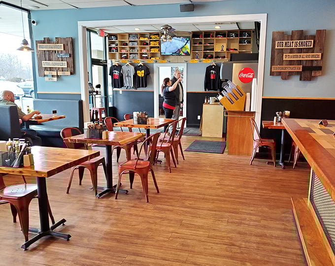 No white tablecloths or pretension here—just honest wood, comfortable chairs, and that magnificent pig watching over your meal like a guardian angel.