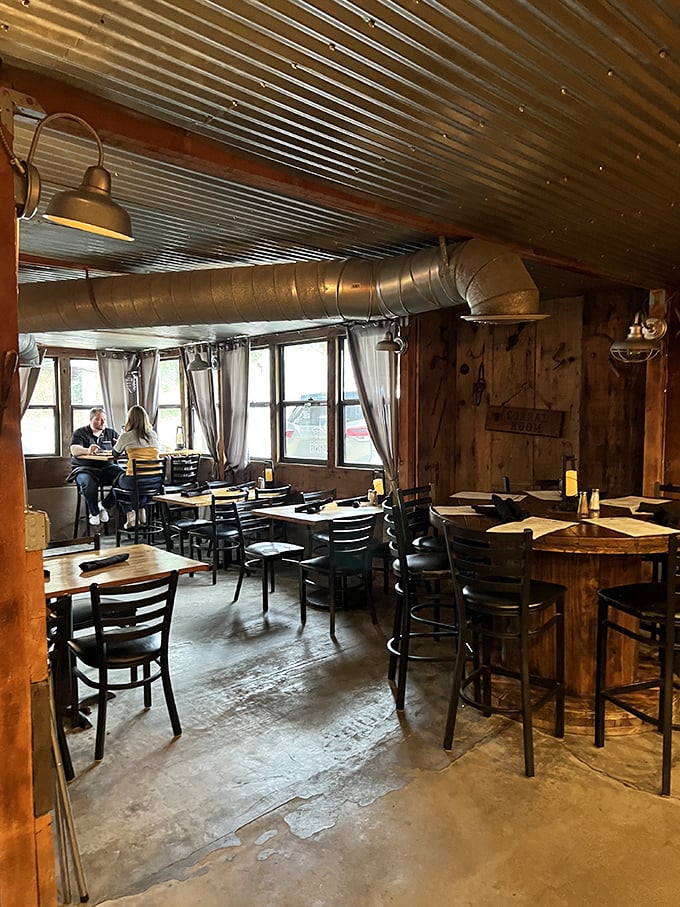 Sunlight streams through windows illuminating rustic wooden tables where countless memorable meals have unfolded over decades.