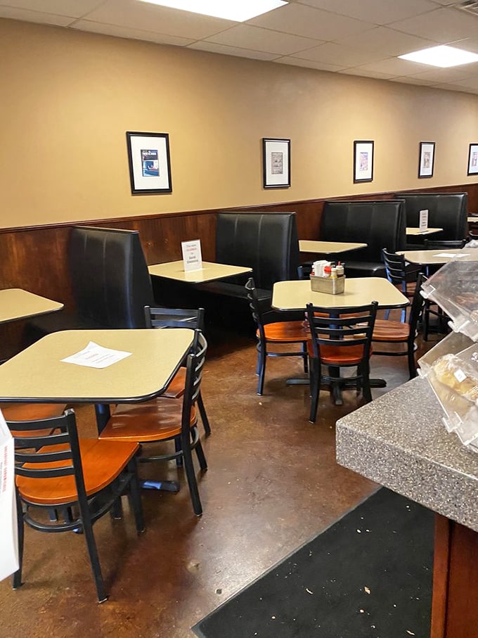 Classic booth seating arranged with military precision – each table a potential site for life-changing sandwich experiences. 