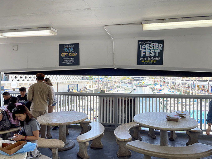 Ocean views with your ocean chews! These outdoor tables offer the perfect backdrop for your seafood feast—just watch out for those seagulls eyeing your lunch.
