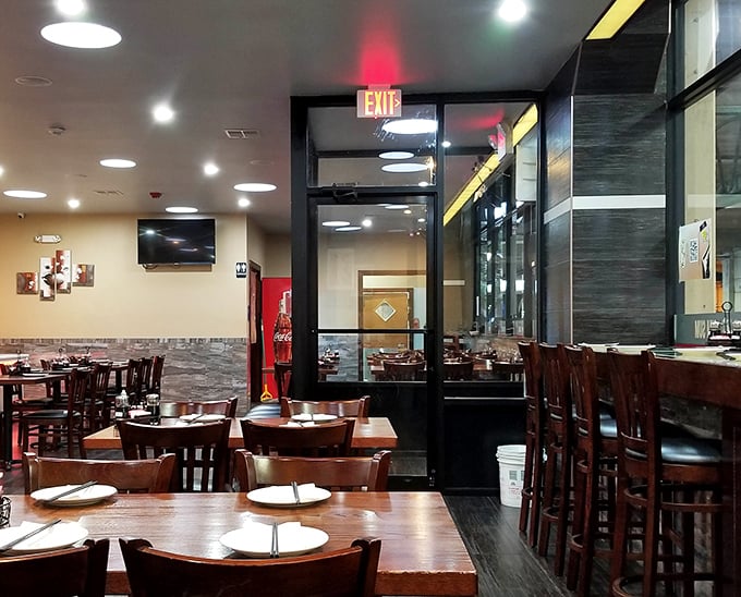 The dining room waits expectantly for the lunch rush, like a theater before the show—soon to be filled with the symphony of chopsticks and conversation.