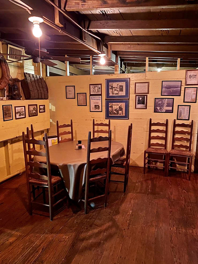 History lines the walls in this dining area—each framed photo and artifact tells a chapter of Cap's storied past.