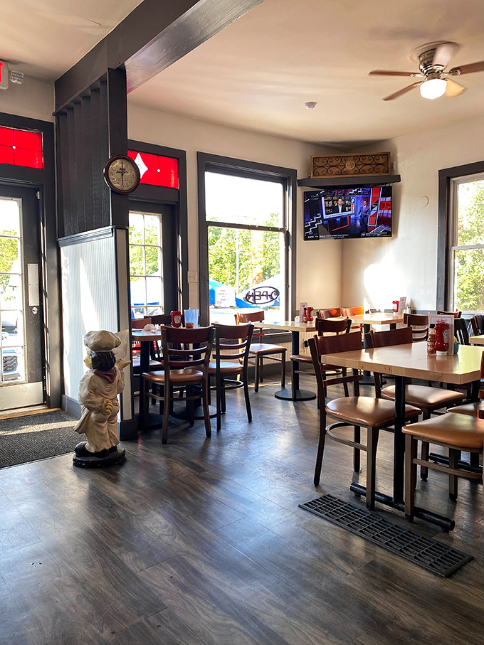 Another angle reveals the thoughtful layout where every seat offers prime people-watching and conversation opportunities.