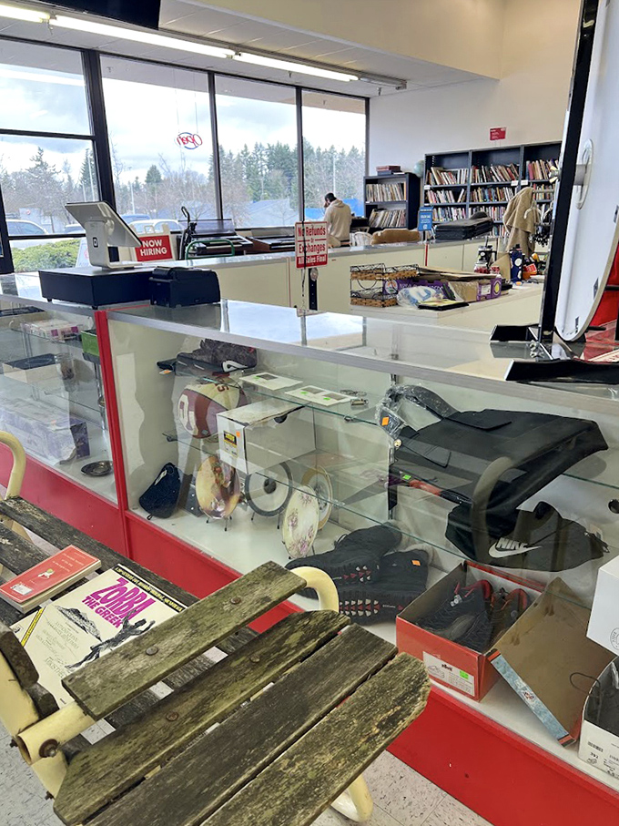 The display counter houses the small but mighty valuables—jewelry, collectibles, and those "I can't believe someone donated this" gems.