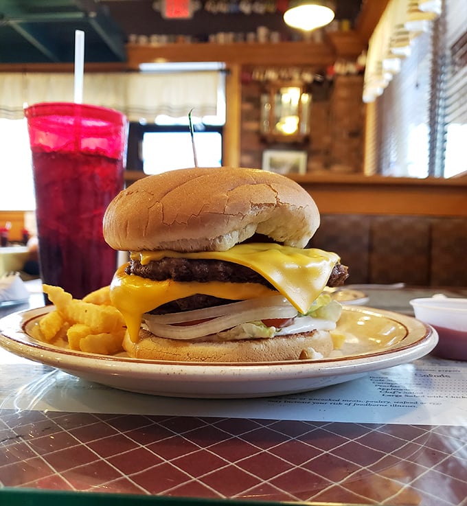 This double cheeseburger towers like a delicious skyscraper, proving lunch can be just as impressive as breakfast.