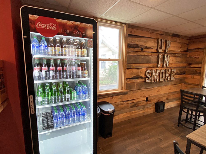 The drink cooler stands ready, because fighting the meat sweats requires proper hydration – barbecue is a full-contact sport.