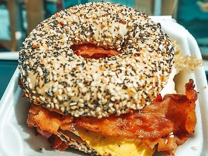 An everything bagel with bacon and egg that makes a compelling argument for skipping lunch and having breakfast twice.