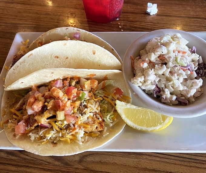 Fish tacos that make you wonder why you'd ever order anything else – fresh, vibrant, and demanding to be photographed before devouring.