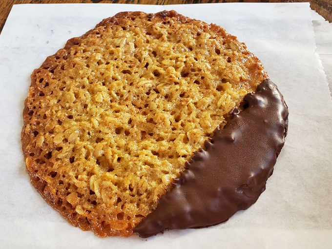 Half-dipped in chocolate, this Florentine cookie is the sophisticated cousin in the pastry family – crisp, caramelized, and impossible to eat just one.